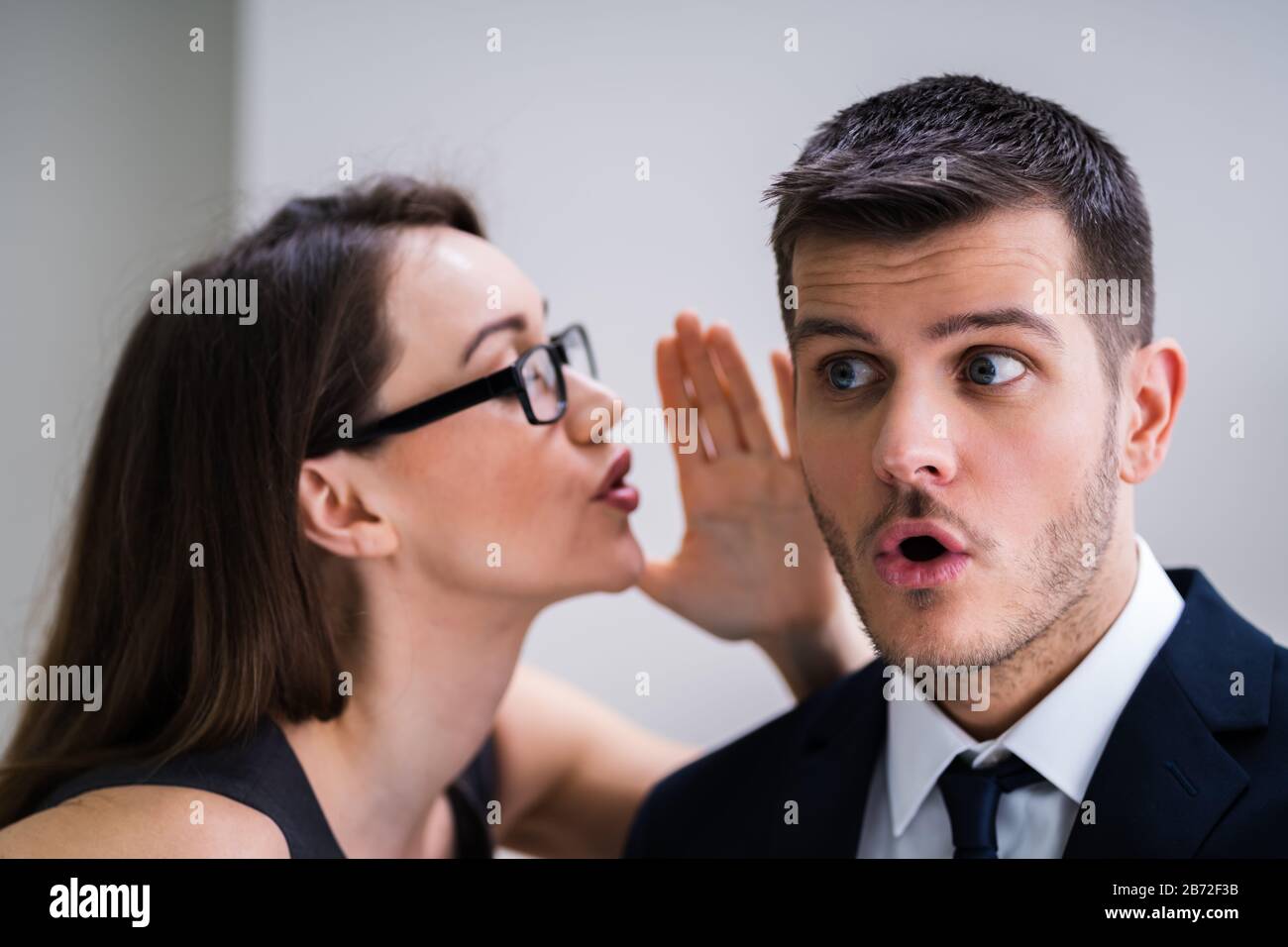 Gossip secret talking friendship hi-res stock photography and images ...