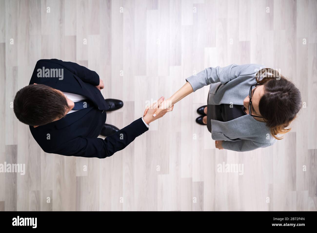 Top view people shake hands hi-res stock photography and images - Alamy