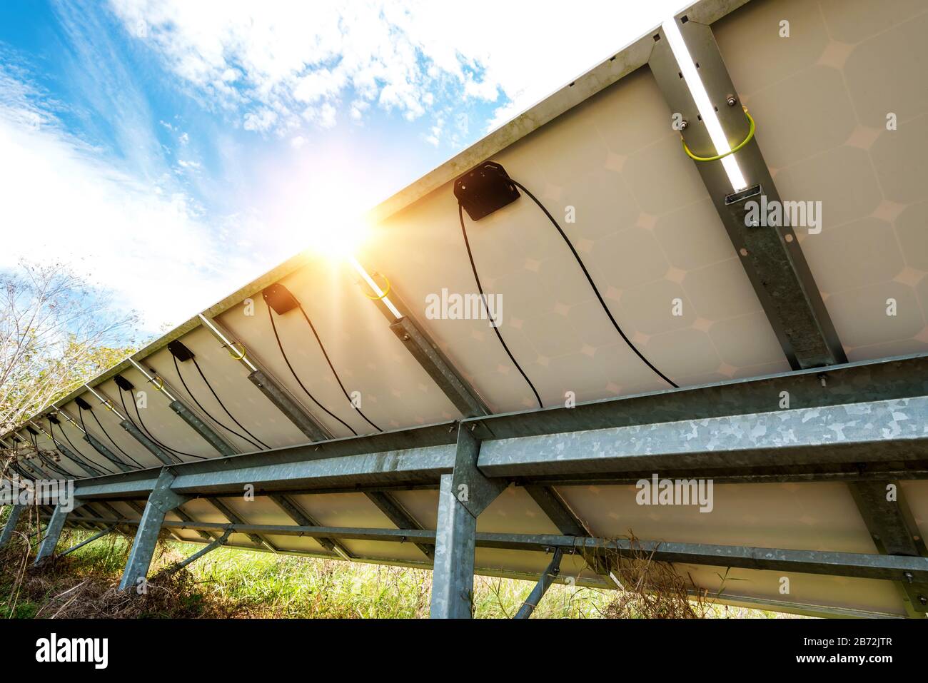 back side view photovoltaics in solar power station - copy space Stock ...