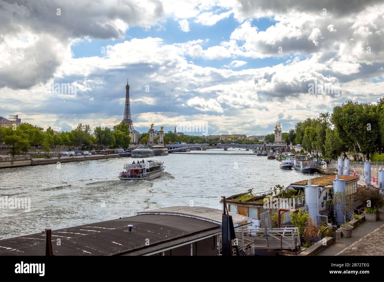 France, Paris. Summer day. River Seine with a view of the Eiffel Tower ...