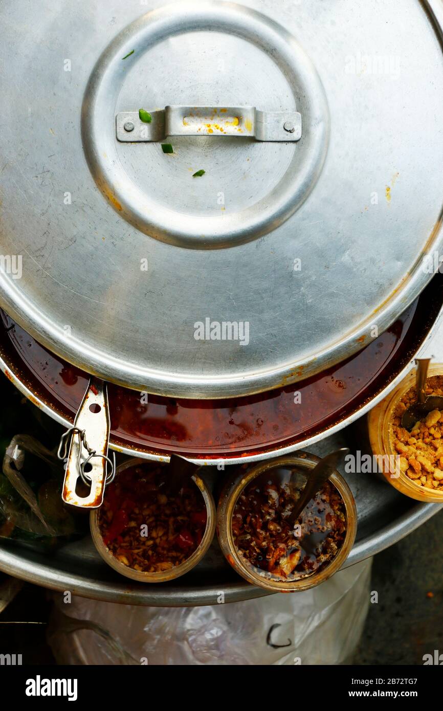 Street food in pot Stock Photo - Alamy