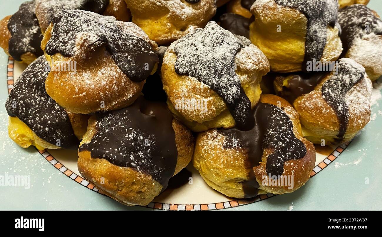 Chocolate Profiterole isolated on white background. Sweet chocolate ...