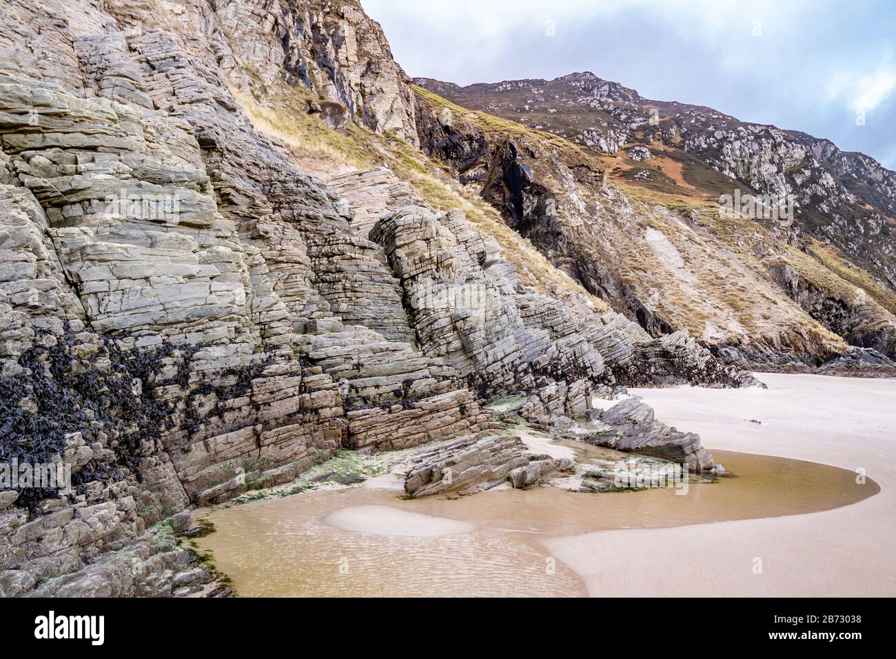 The beach and caves at Maghera Beach near Ardara, County Donegal ...