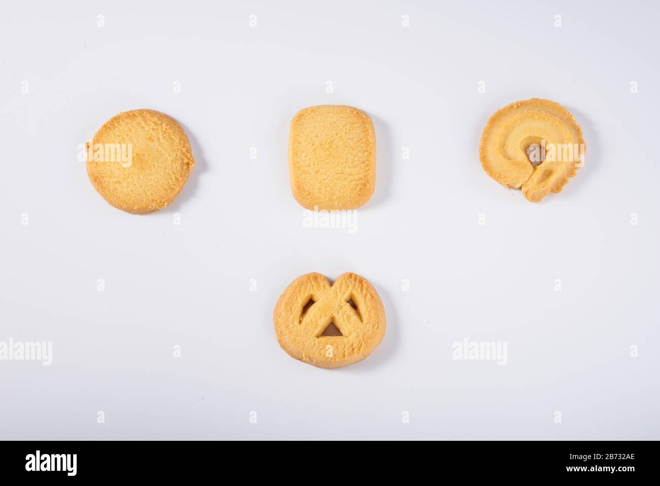 Four different shapes of cookies closeup Stock Photo - Alamy
