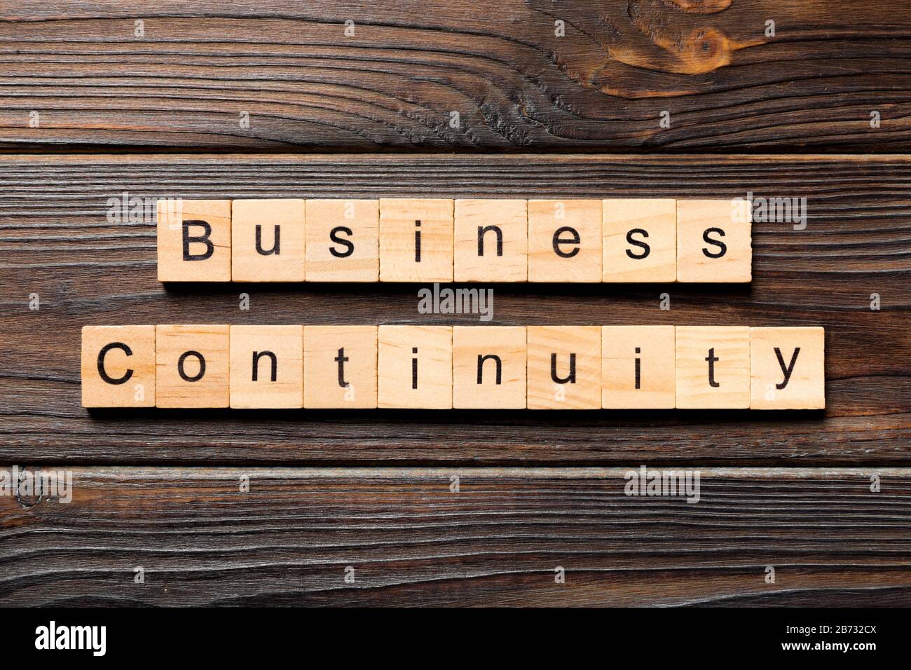 Business Continuity word written on wood block. Business Continuity ...