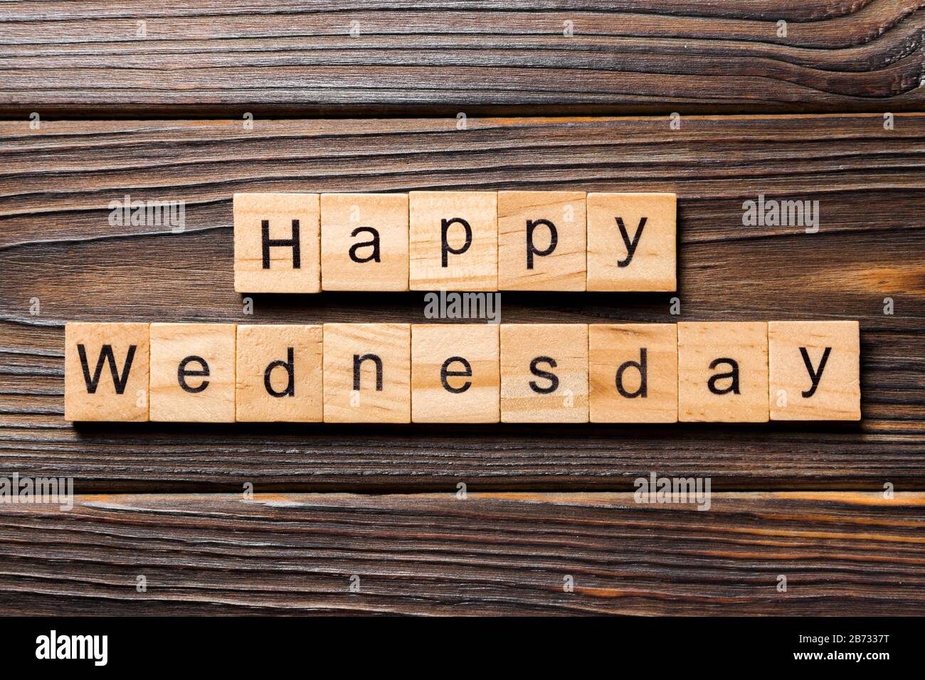 Happy wednesday word written on wood block. Happy wednesday text on ...