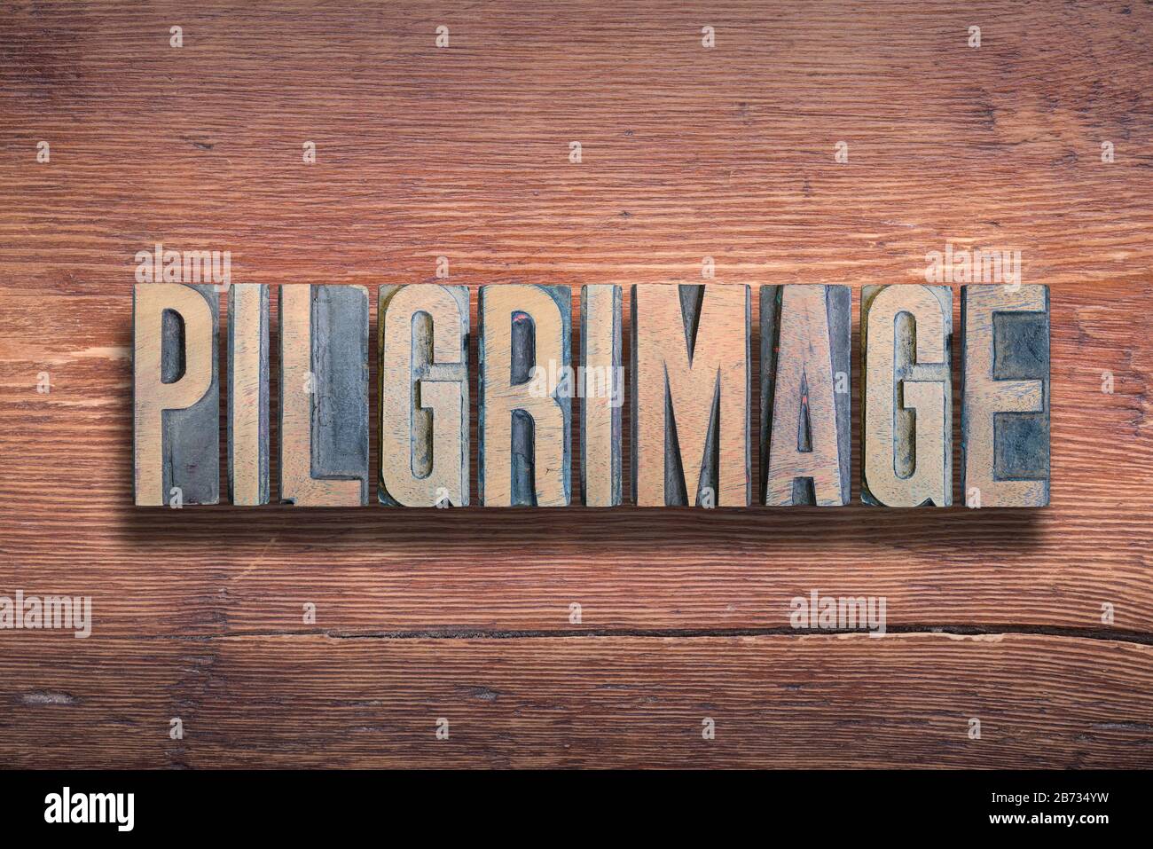 pilgrimage word combined on vintage varnished wooden surface Stock ...