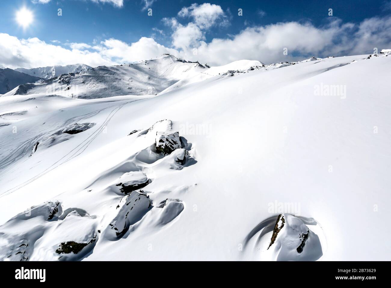High mountain view in winter. Ski routes in the mountains. Snowy winter ...