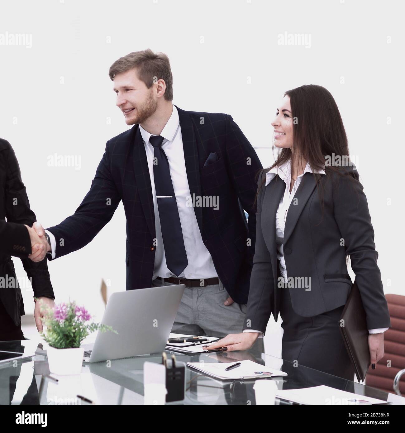 business woman greets the employee with a handshake Stock Photo - Alamy
