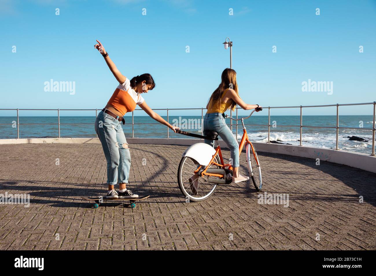 Girl having fun riding bicycle hi-res stock photography and images - Alamy