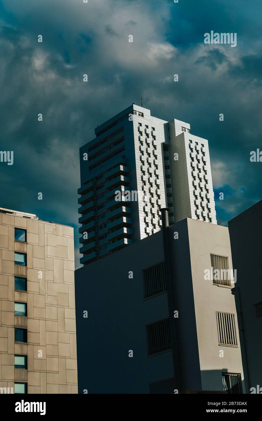 Dramatic cloudy sky over the tall buildings of an urban city Stock ...