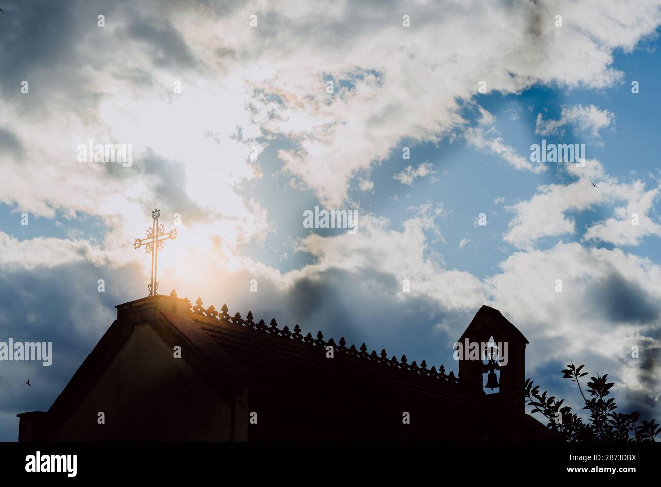 Backlit holy cross hi-res stock photography and images - Alamy