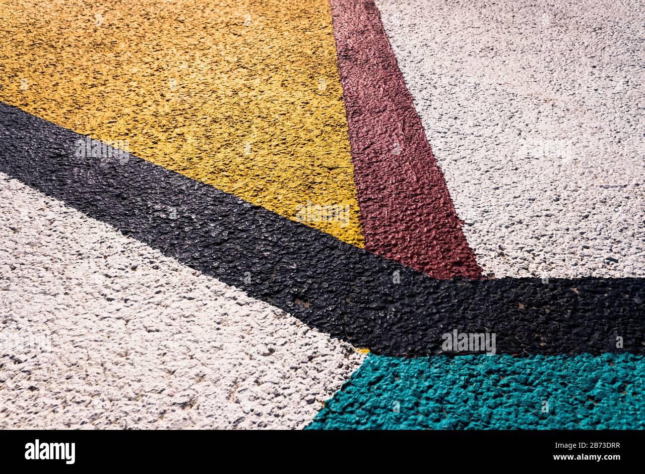 Painted asphalt of bright colors as artistic background Stock Photo - Alamy