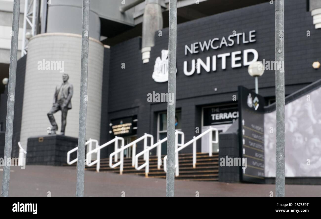 A view through gates at St James' Park, Newcastle Stock Photo - Alamy