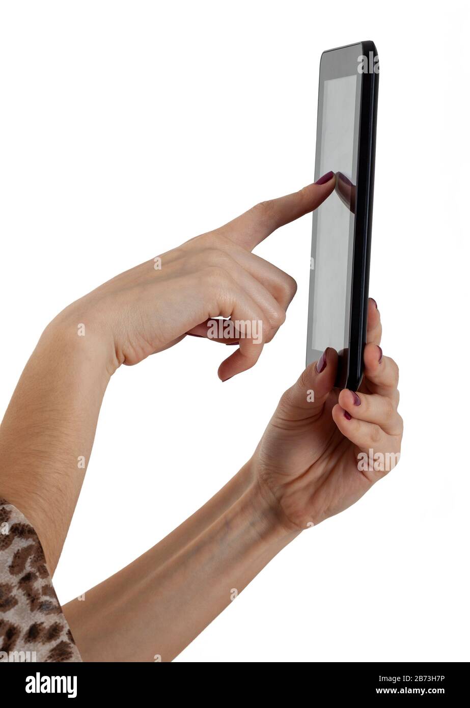 Hands touching the display of a smartphone, isolated against a white ...