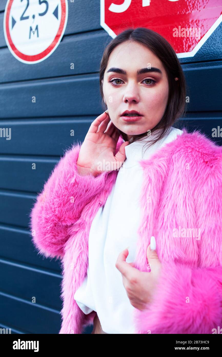 young cute girl teenager gesturing hanging around city parking and ...