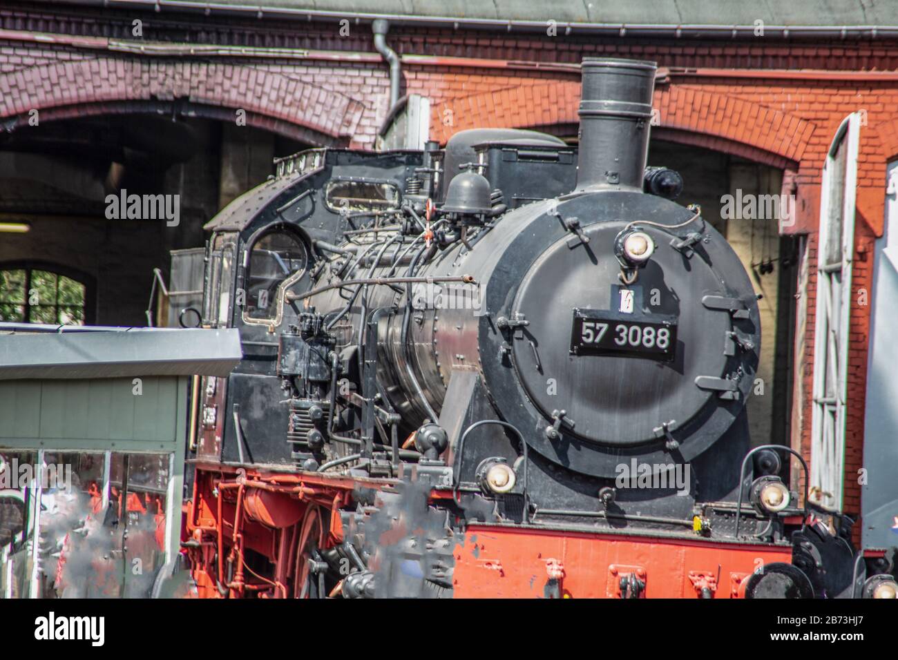 Locomotive shed with electric and diesel locomotives Stock Photo - Alamy
