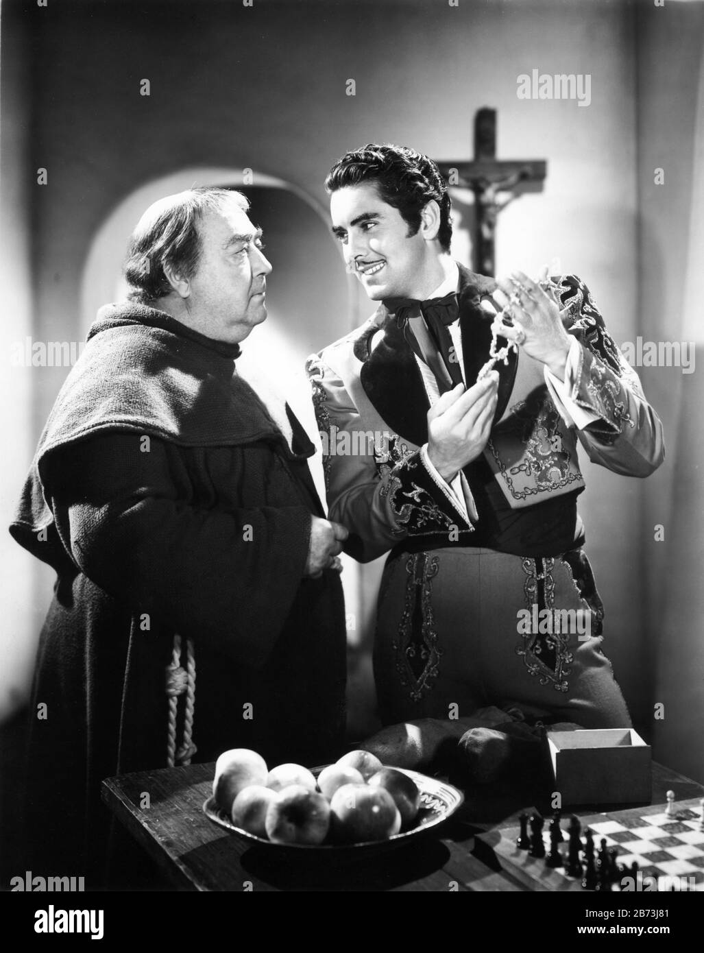 EUGENE PALLETTE as Fray Felipe and TYRONE POWER as Diego Vega aka Zorro ...