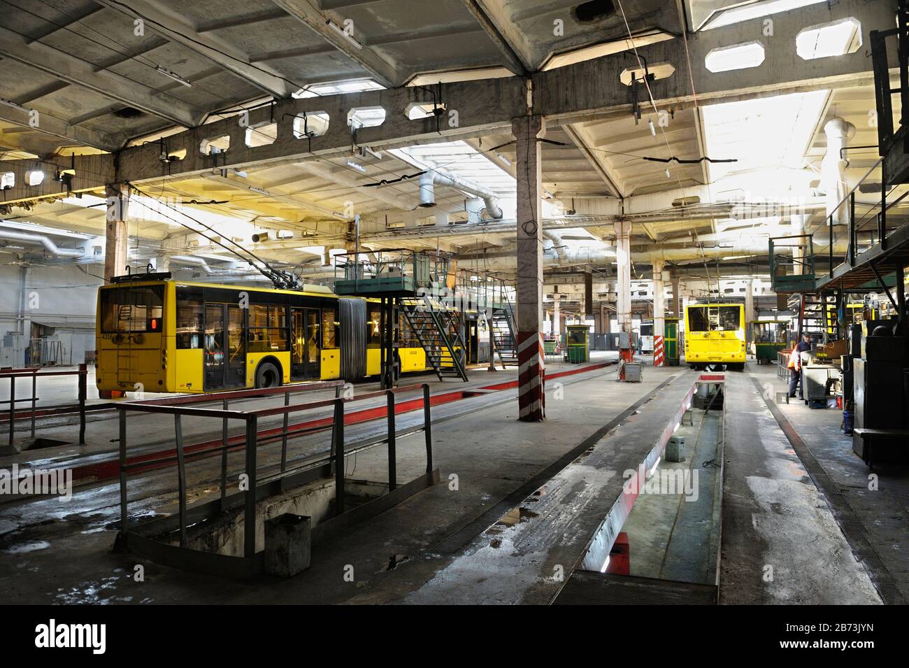 Trolleybuses parked at the trolley depot hangar for technical ...