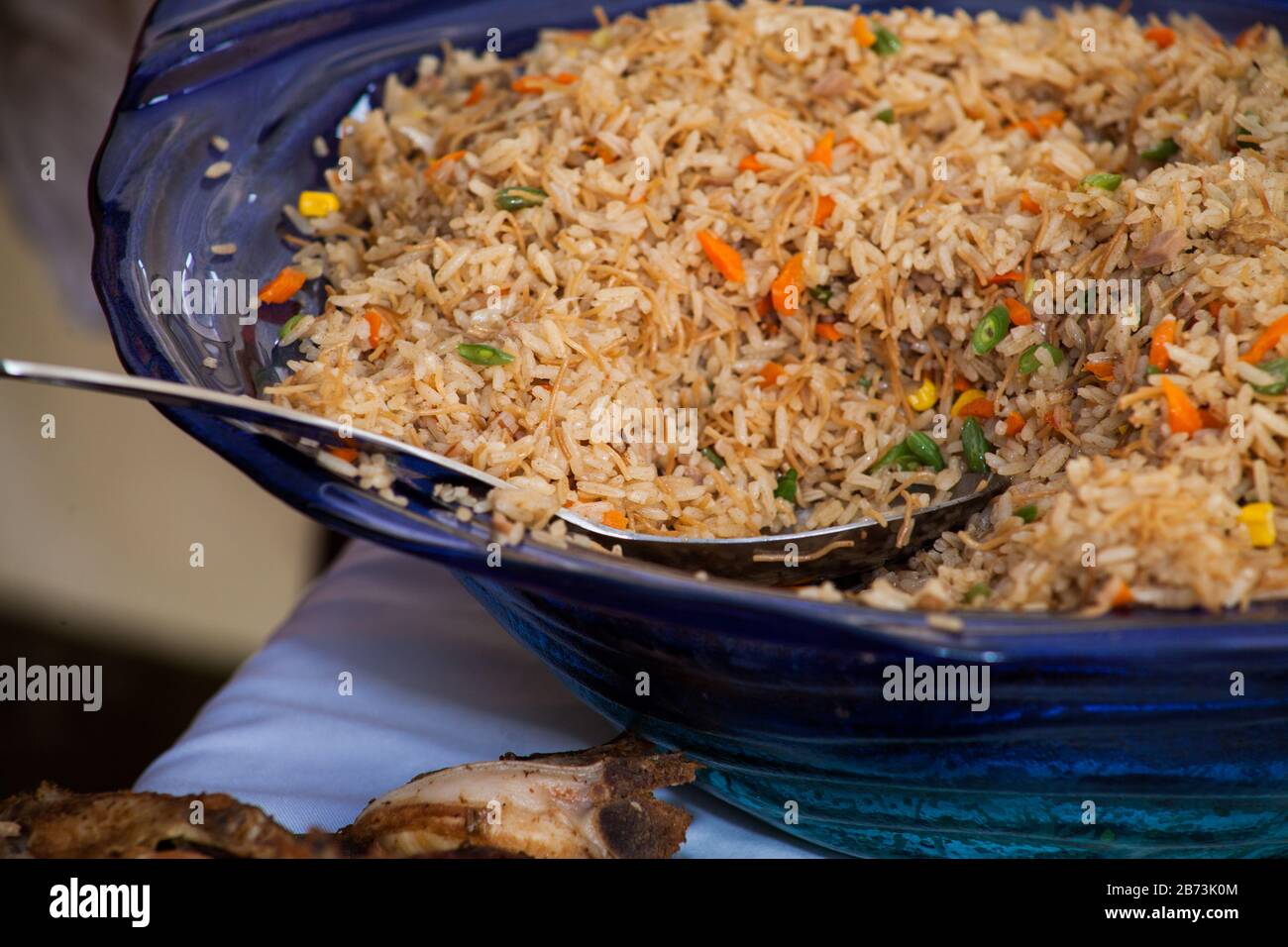 Cameroonian Jellof of jollof rice on the buffet table at a party for ...