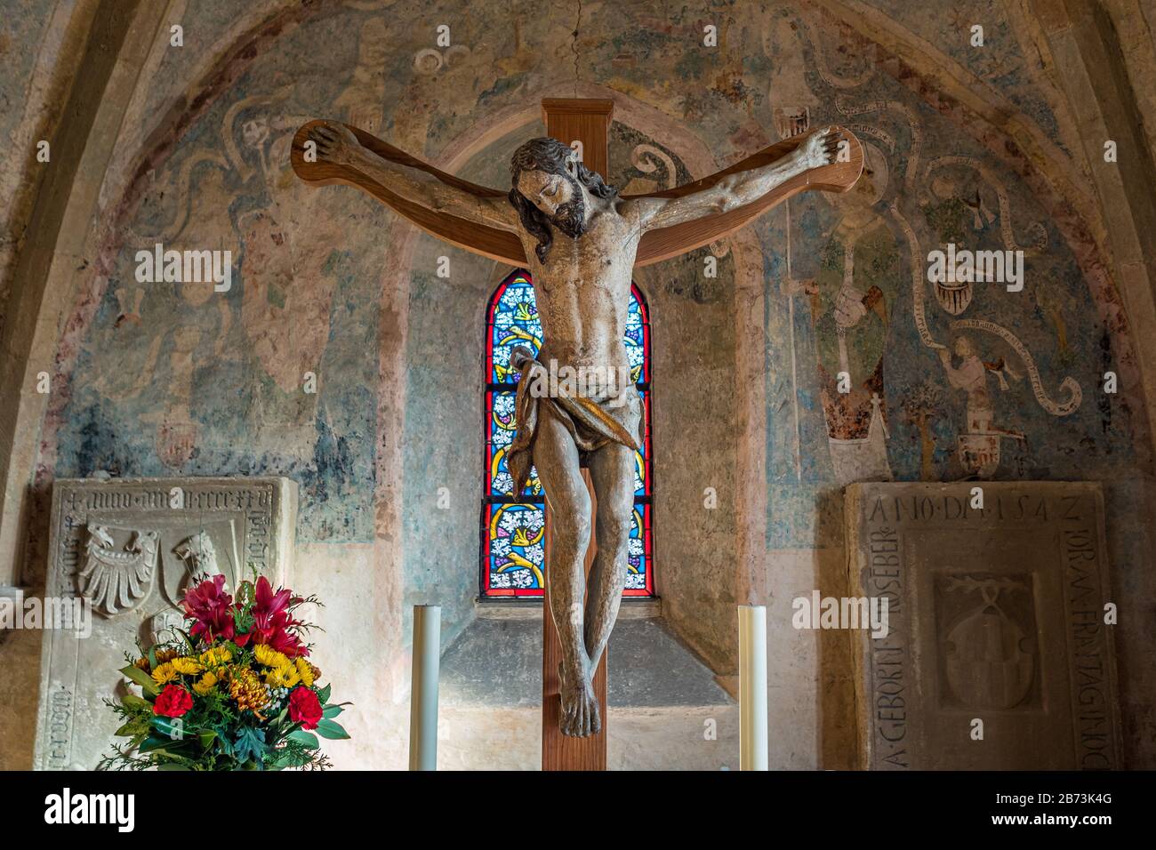 Cross with Jesus Christ in a small church in Germany Stock Photo - Alamy