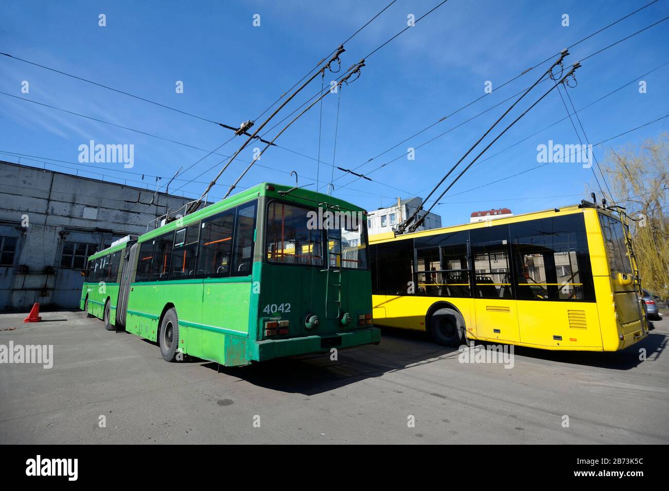 Trolleybuses parked in front of the trolley depot hangar. March 11 ...