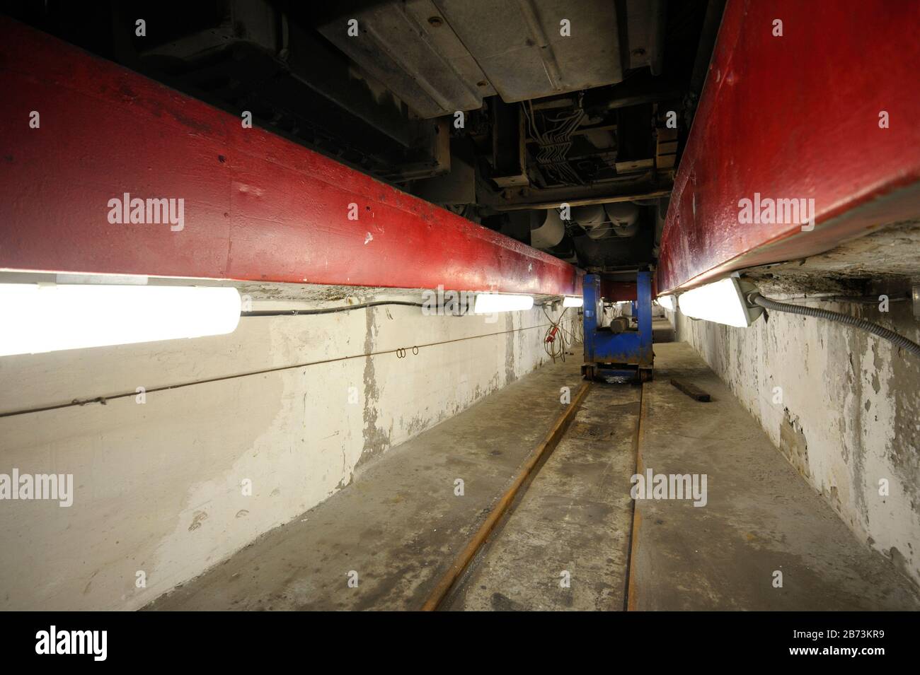 Vehicle inspection pit and the bottom of the trolley Stock Photo - Alamy