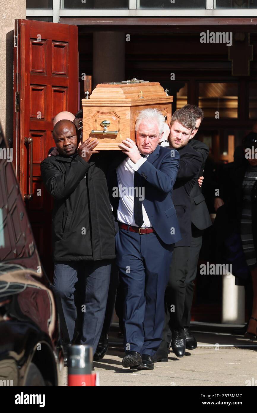 The coffin is carried from St Colmcille's Church, Holywood, Co Down at ...