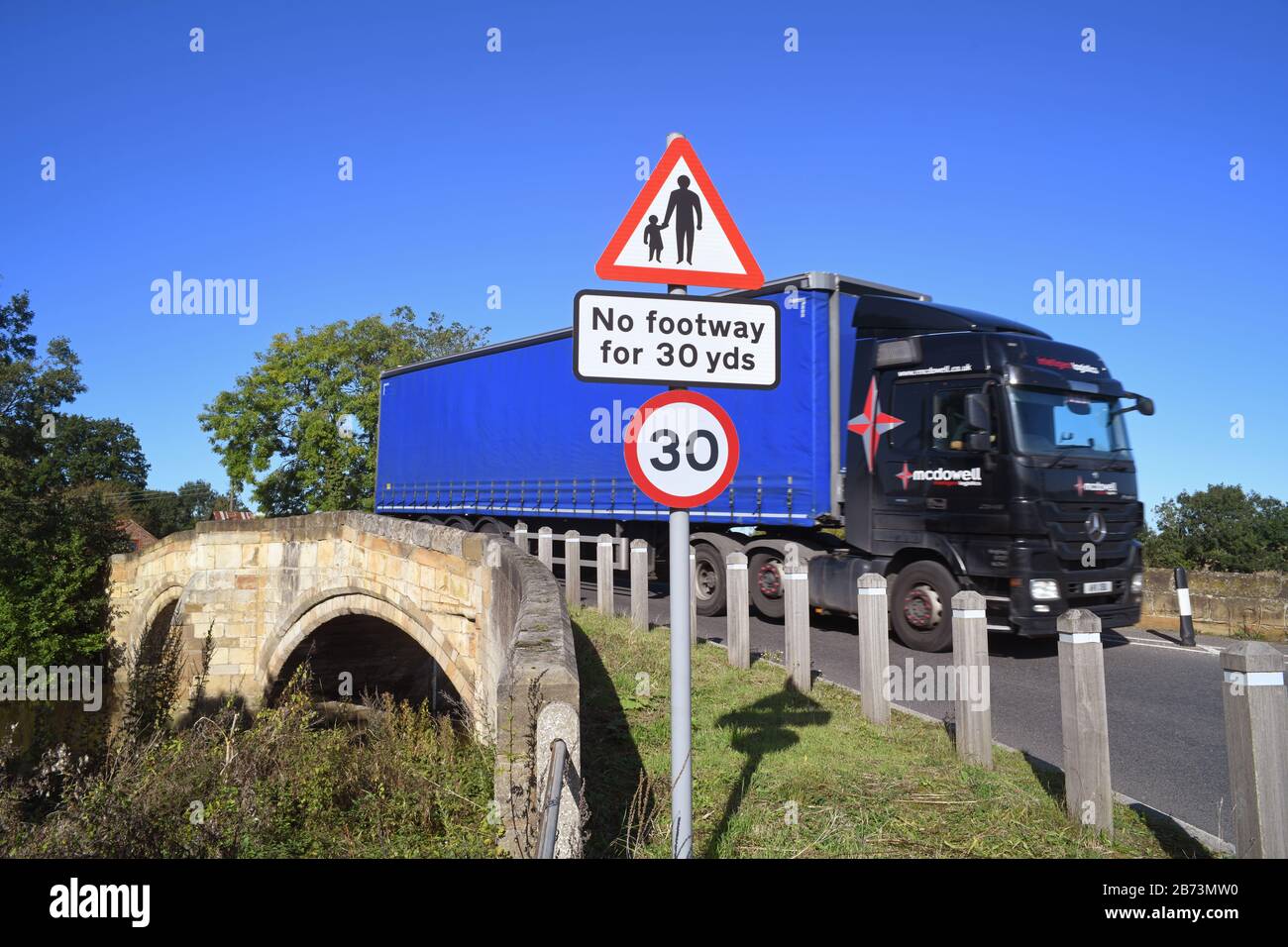 Narrow bridge ahead road sign hi-res stock photography and images - Alamy
