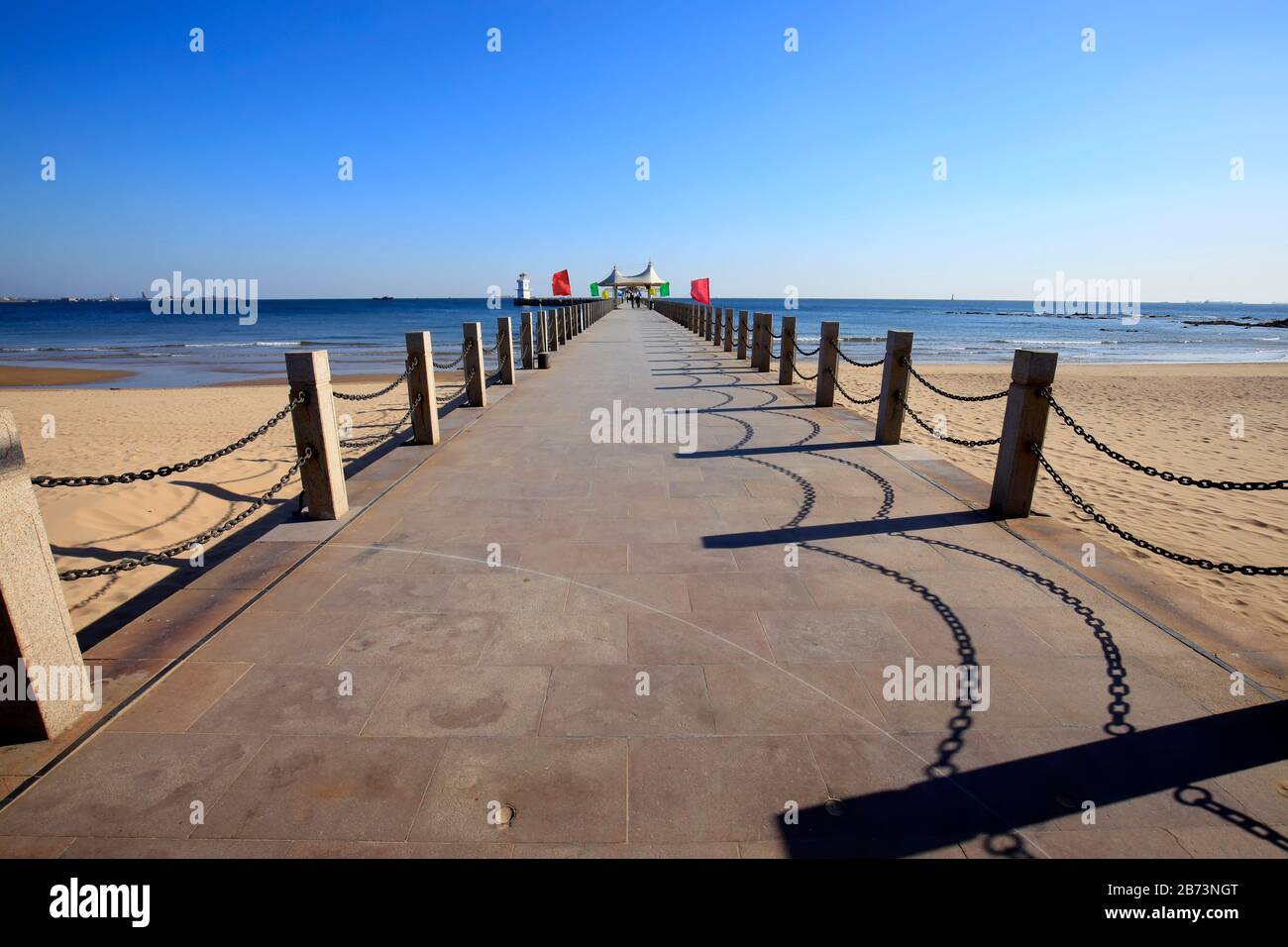 The seaside scenery and the seaside pier Stock Photo - Alamy