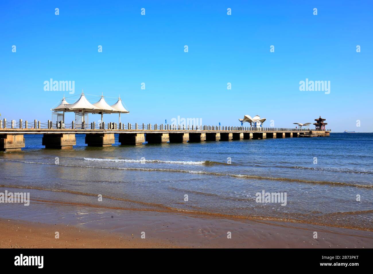 The seaside scenery and the seaside pier Stock Photo - Alamy