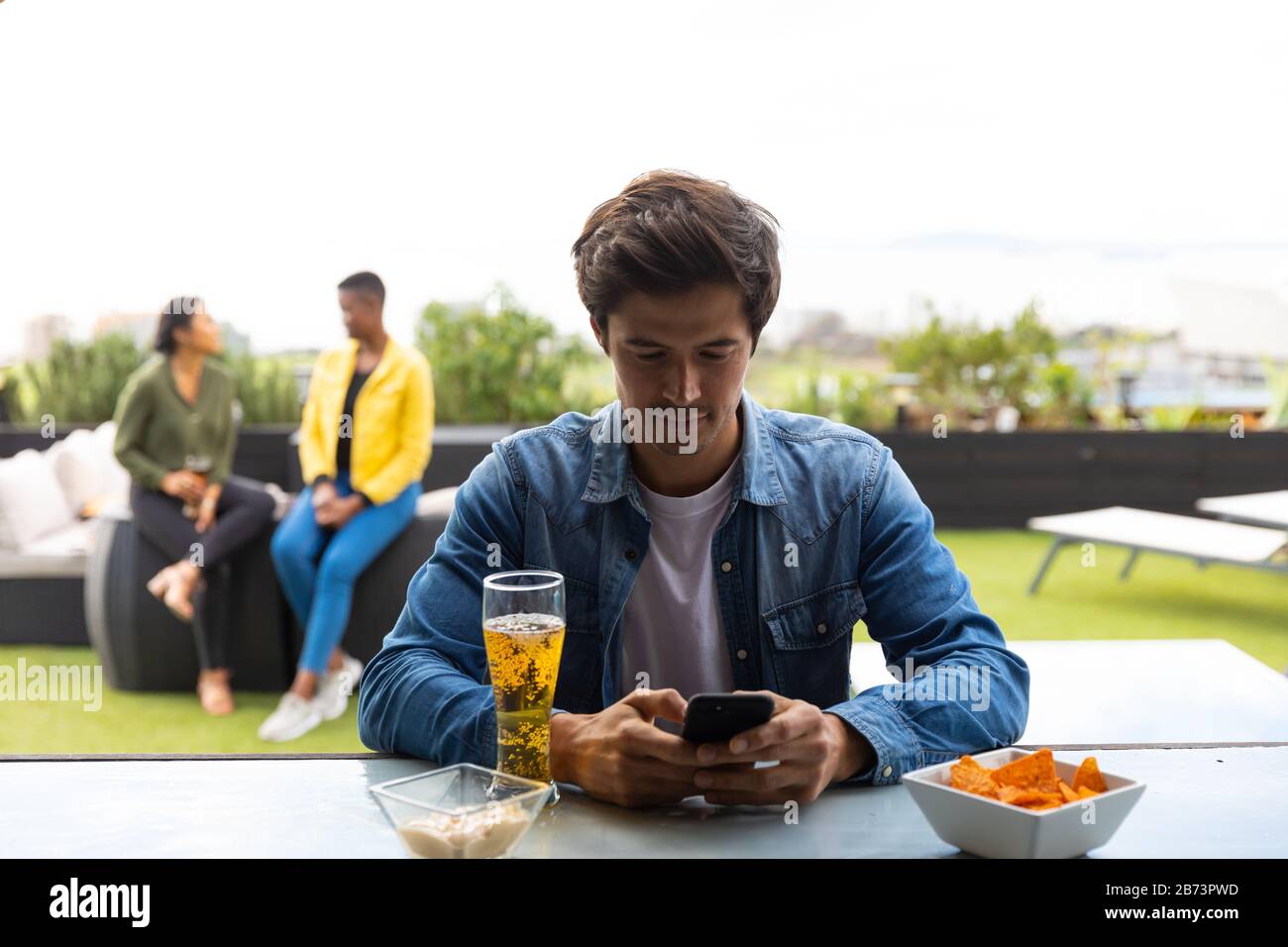 Rooftop gathering hi-res stock photography and images - Alamy