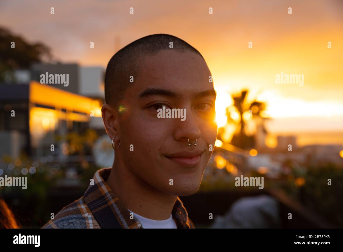 Man on rooftop terrace hi-res stock photography and images - Alamy
