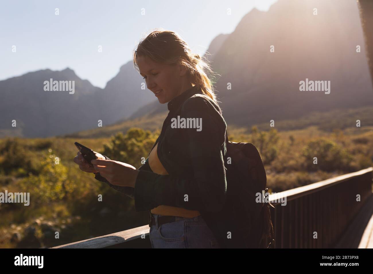 Woman backpack looking view hi-res stock photography and images - Alamy
