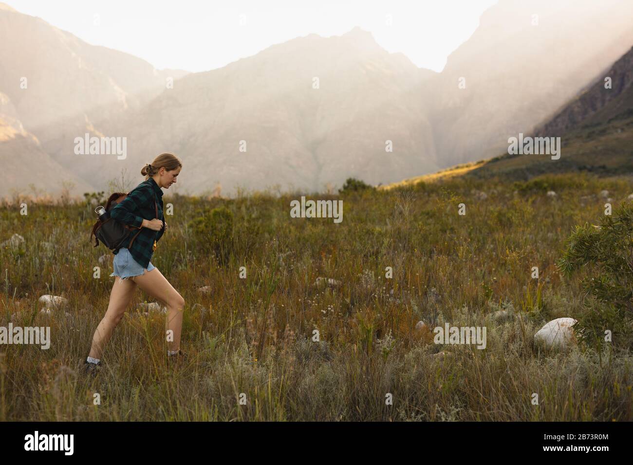 Walking field woman side view outside hi-res stock photography and ...