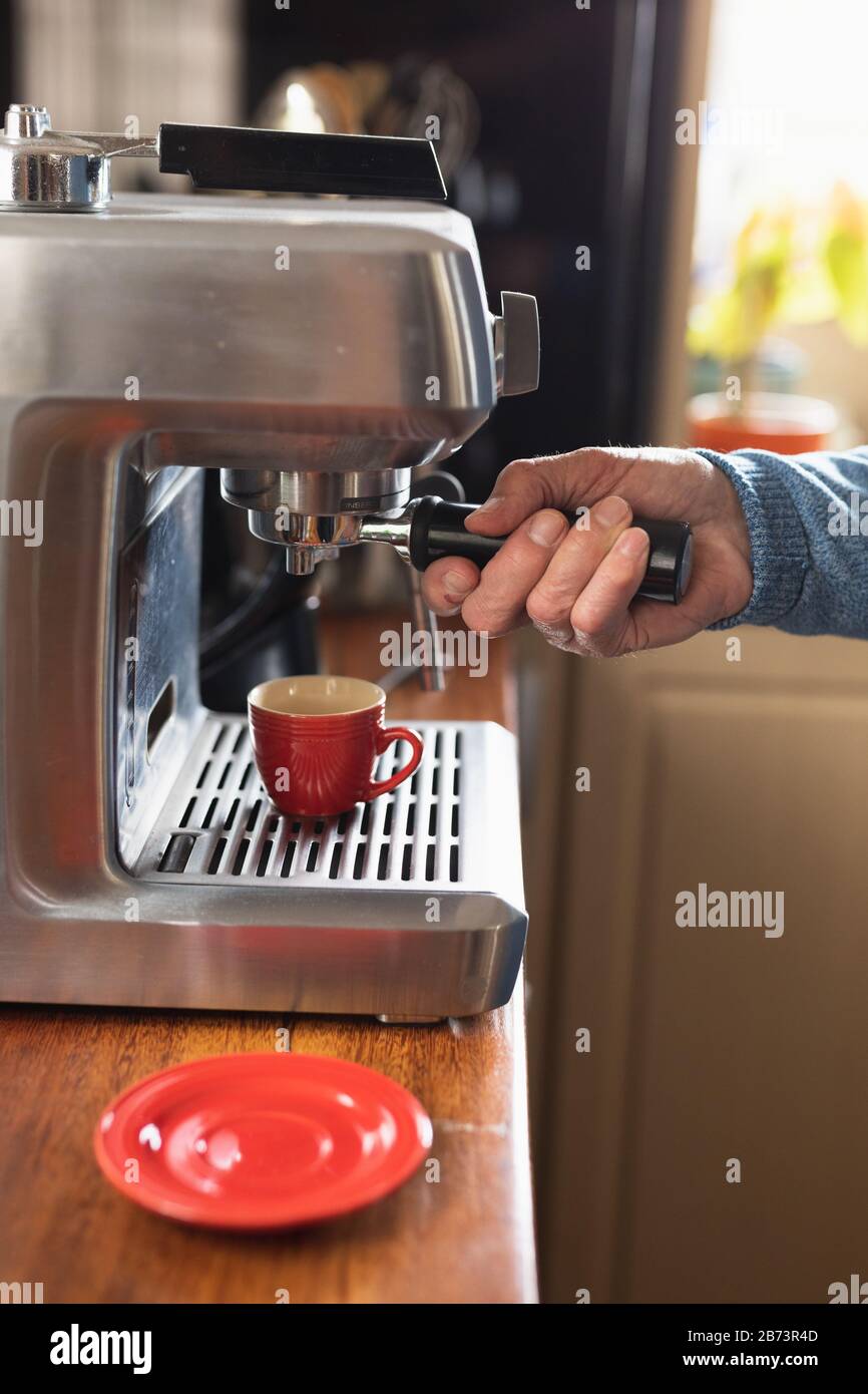Man making espresso hi-res stock photography and images - Alamy