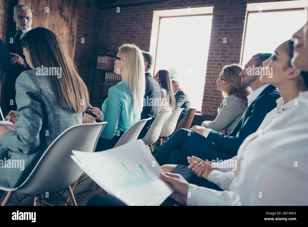 Side profile close up view photo of serious attentive smart large crowd ...