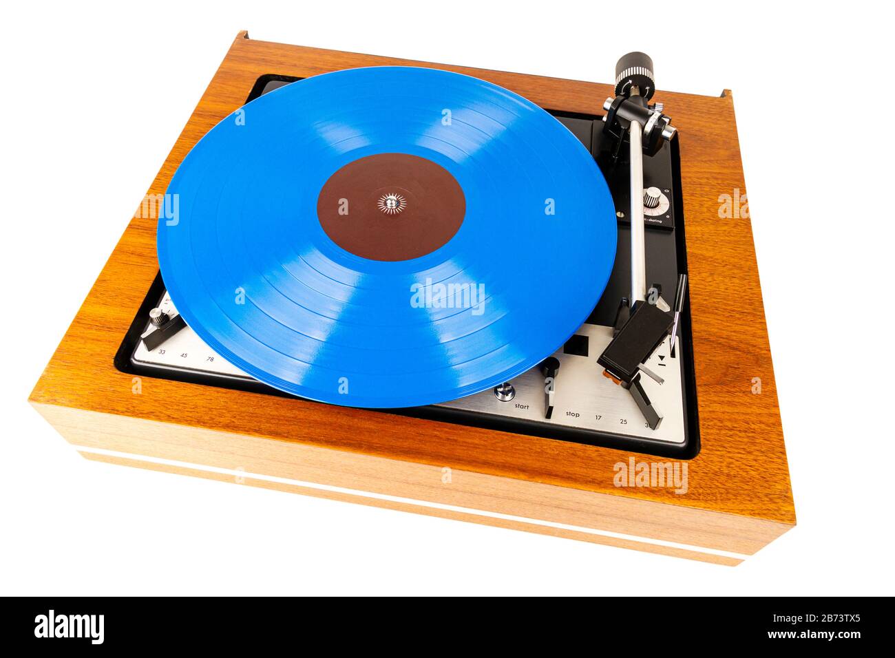 Vintage turntable with a blue vinyl isolated on white. Wooden plinth ...