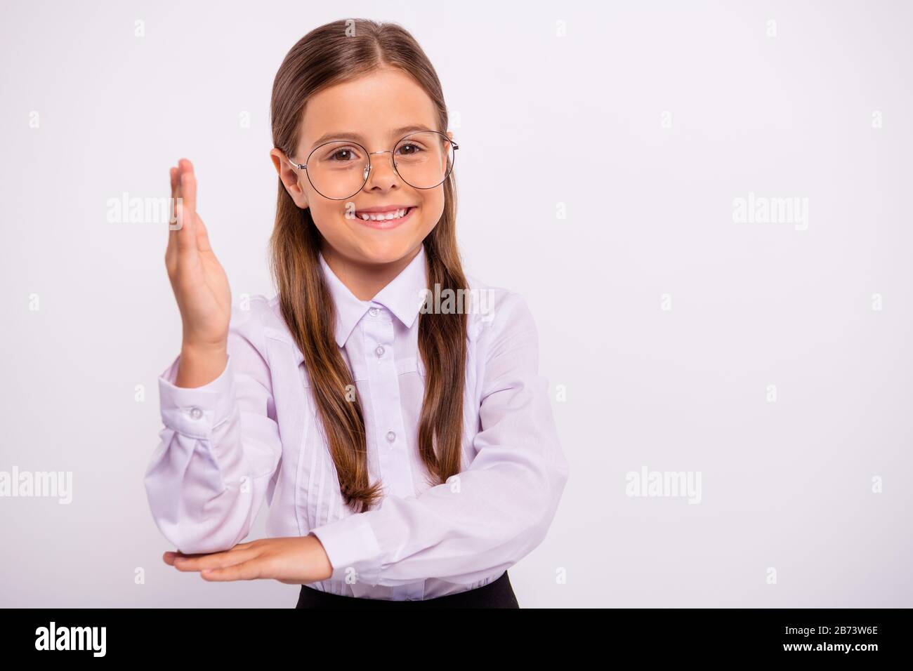 Child raising hand up isolated hi-res stock photography and images - Alamy