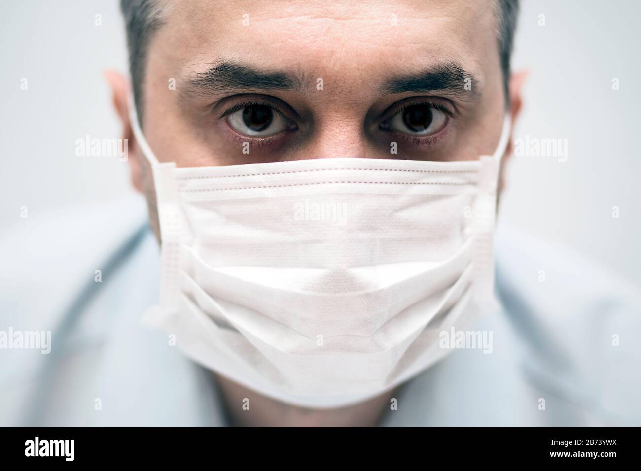 Man wearing protection face mask against coronavirus Stock Photo - Alamy