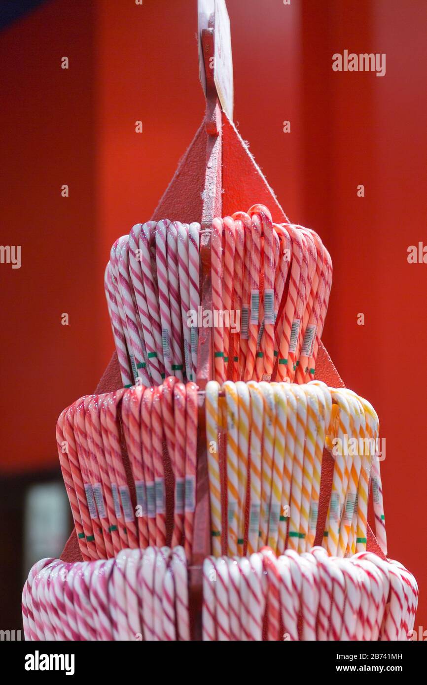 Colorful Candy Sticks inside a Display Stand Stock Photo - Alamy