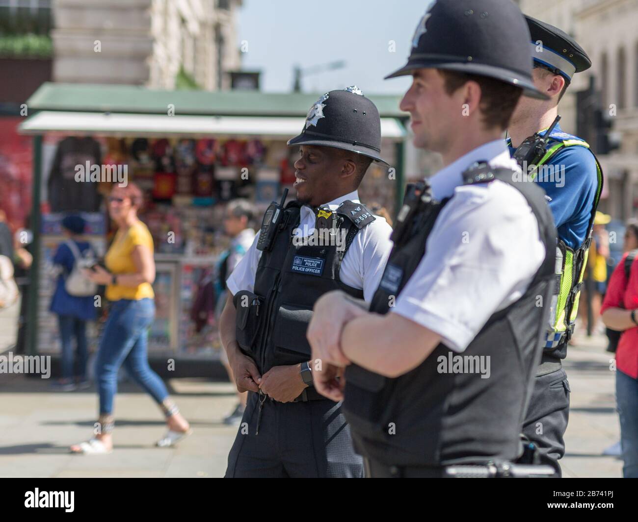 Street Photography: Group of London Policemen with Their Uniform Stock ...