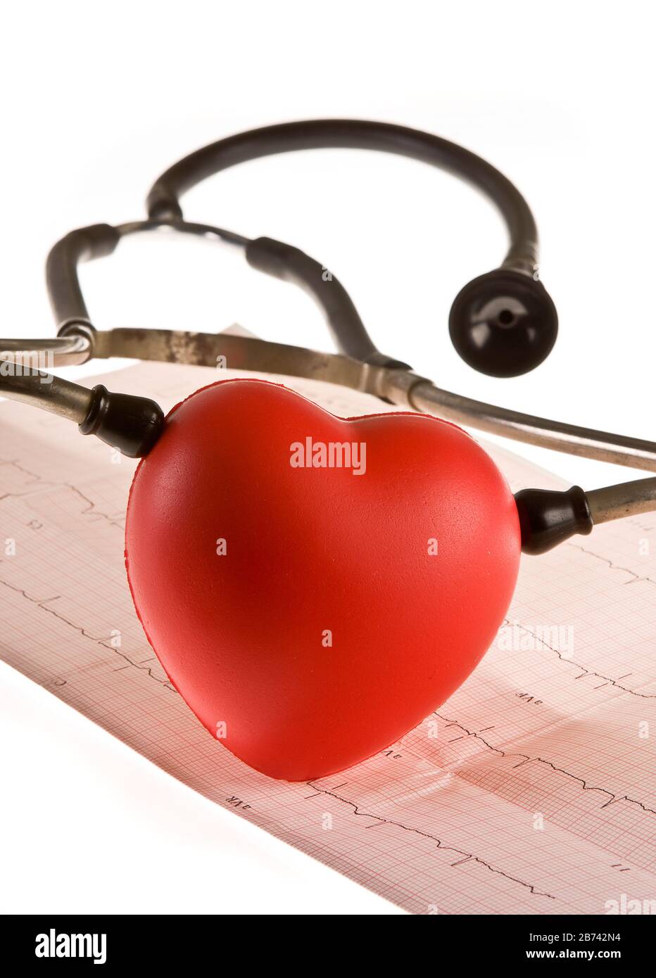 Stethoscope and heart lying on a cardiogram Stock Photo - Alamy