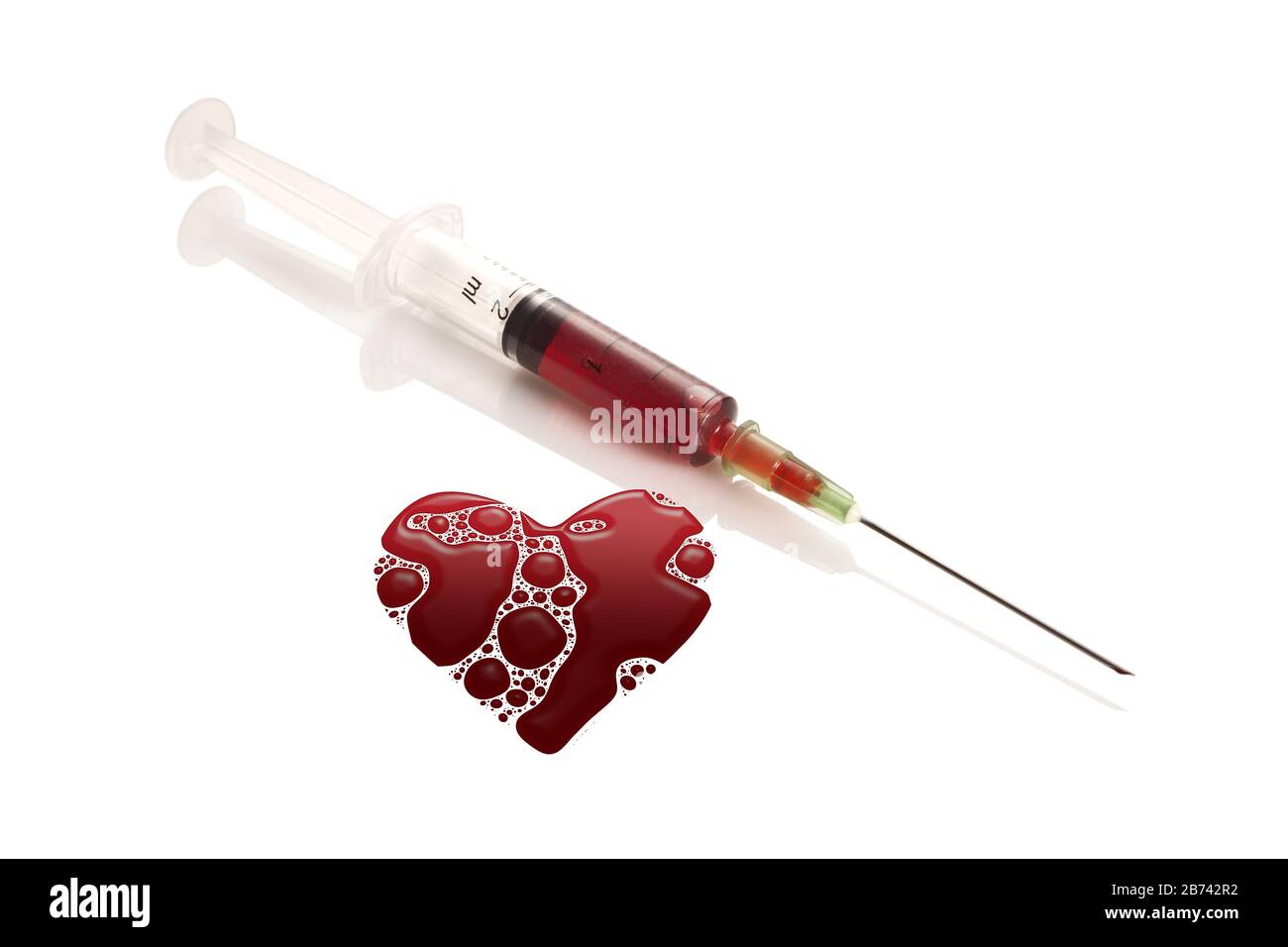 Syringe and a red blood stain in heart shape Stock Photo - Alamy