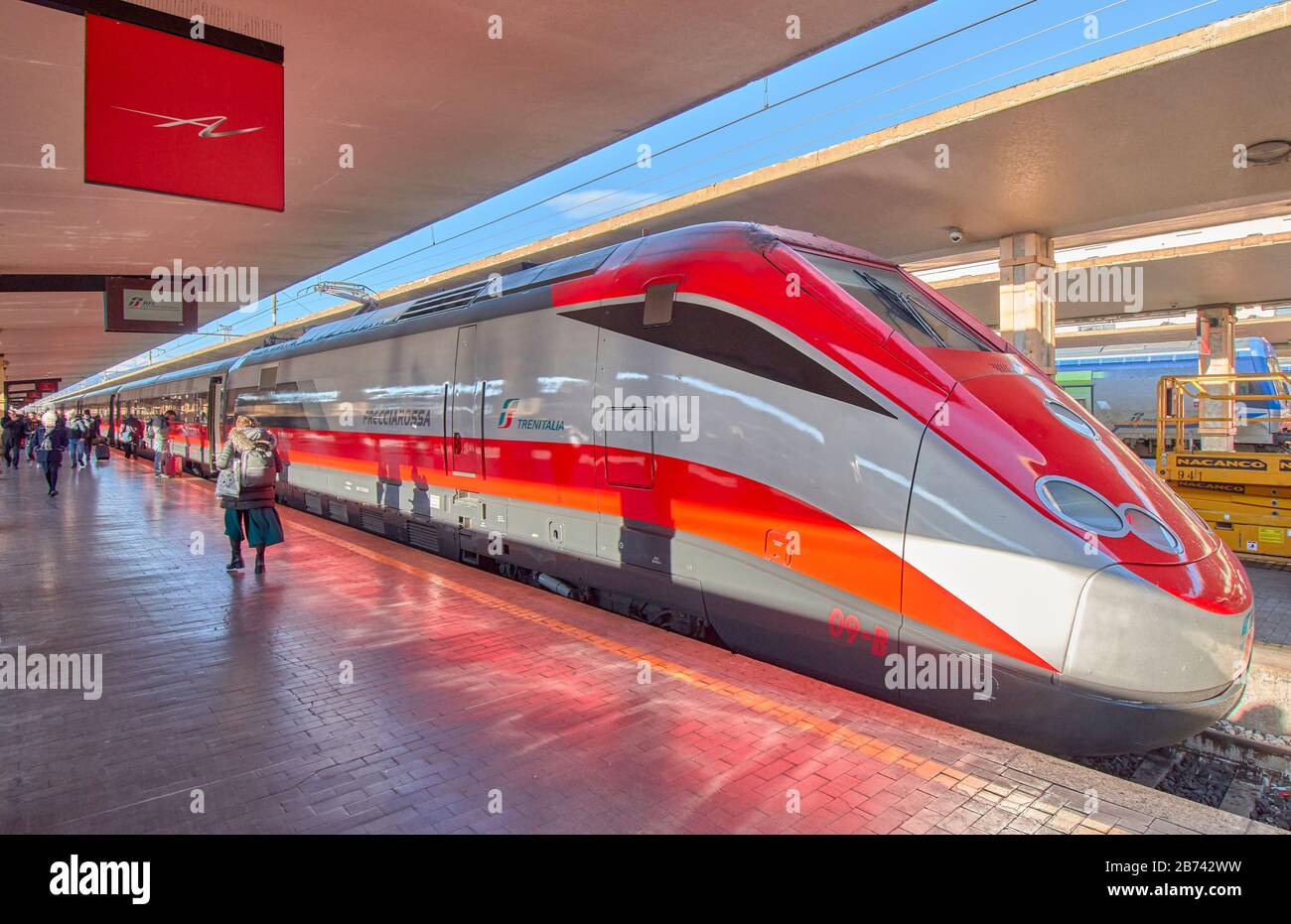 FLORENCE ITALY PASSENGERS ON THE PLATFORM AND THE TRENITALIA TRAIN ...