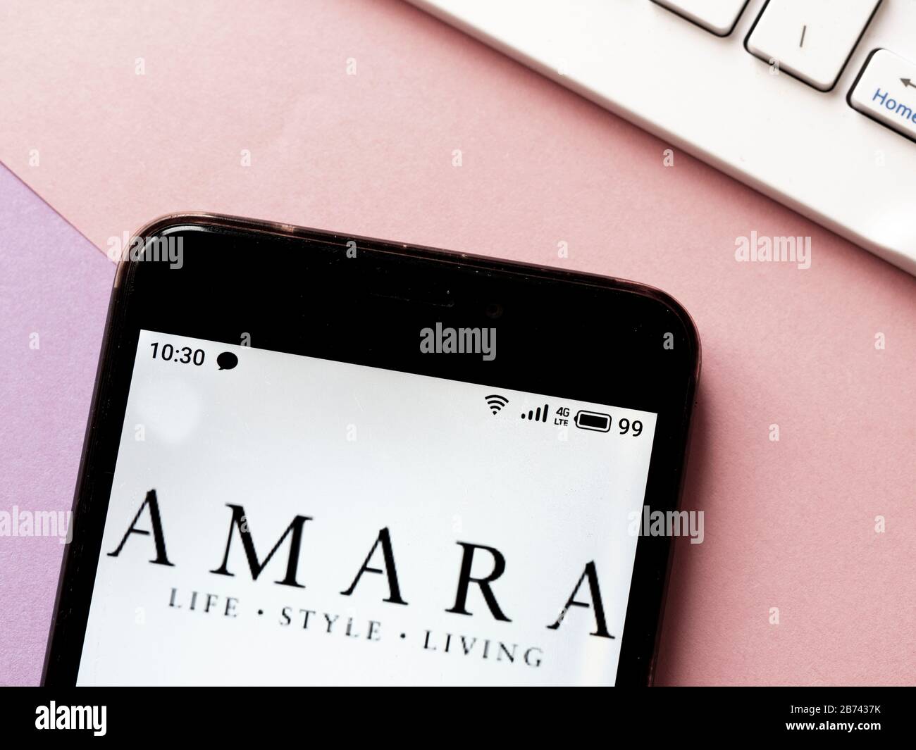 In this photo illustration an Amara logo seen displayed on a smartphone ...