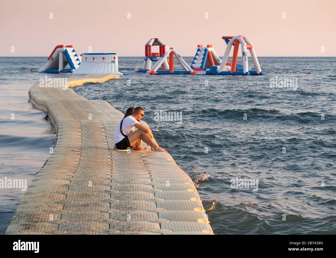 Couple floating in the sea hi-res stock photography and images - Alamy
