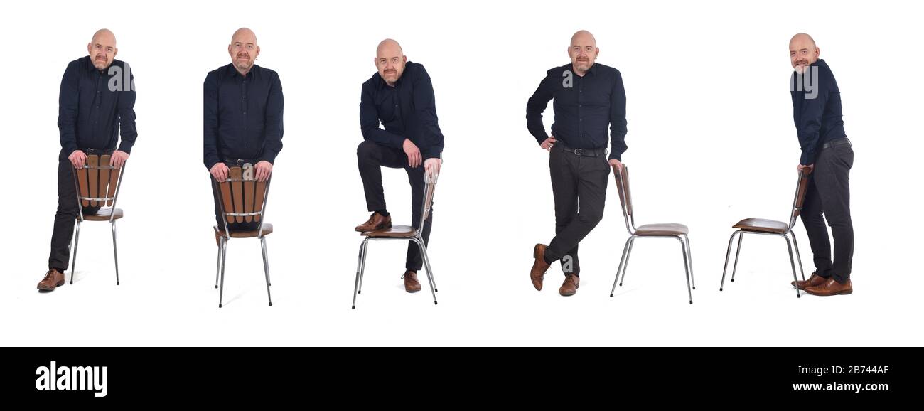 group of man standing with a chair in white background Stock Photo - Alamy