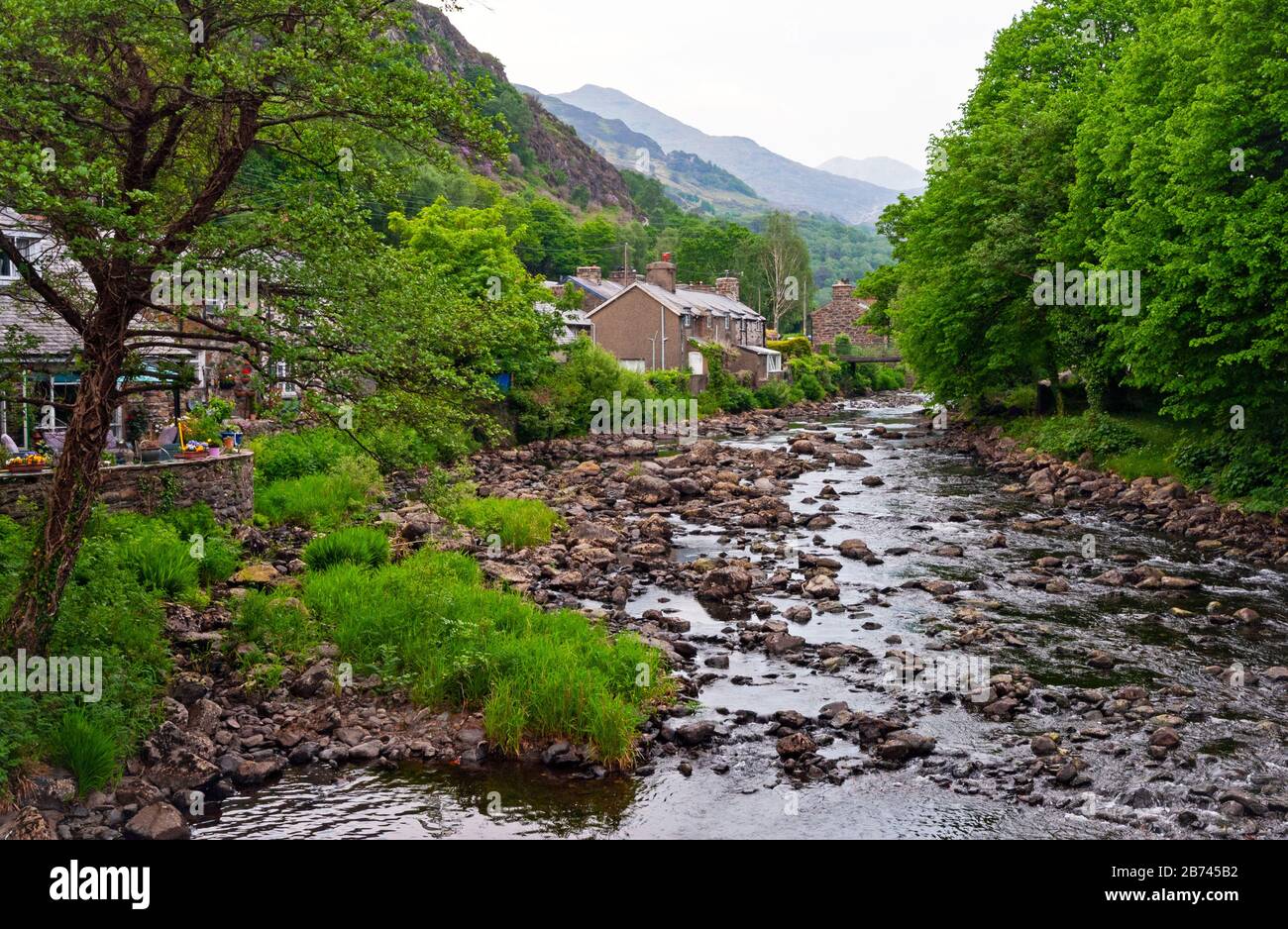 Stream through Beddgelert, Wales Stock Photo - Alamy