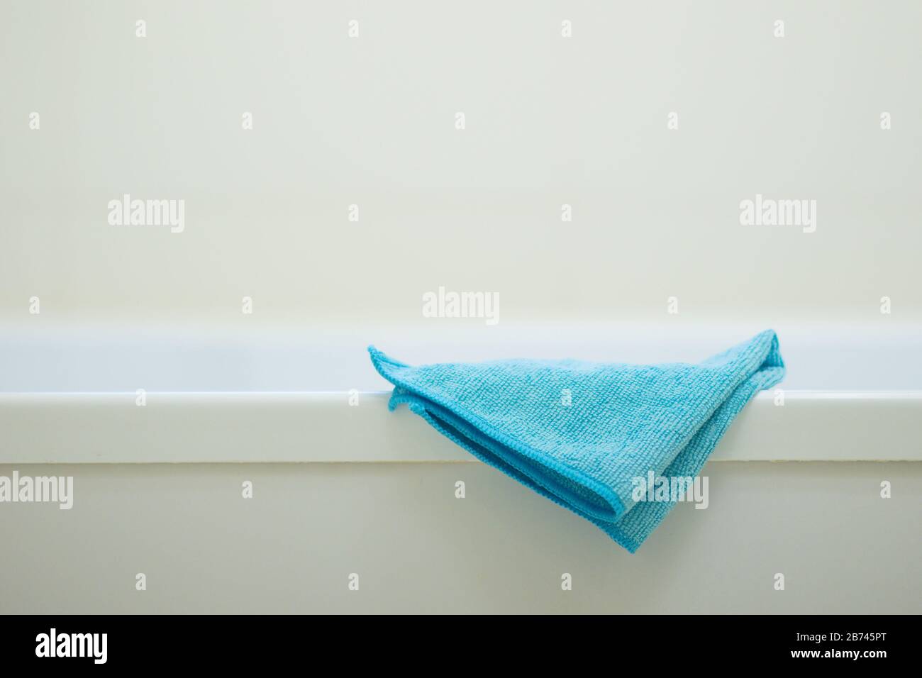 A new blue cleaning cloth lies on the bathroom Stock Photo - Alamy